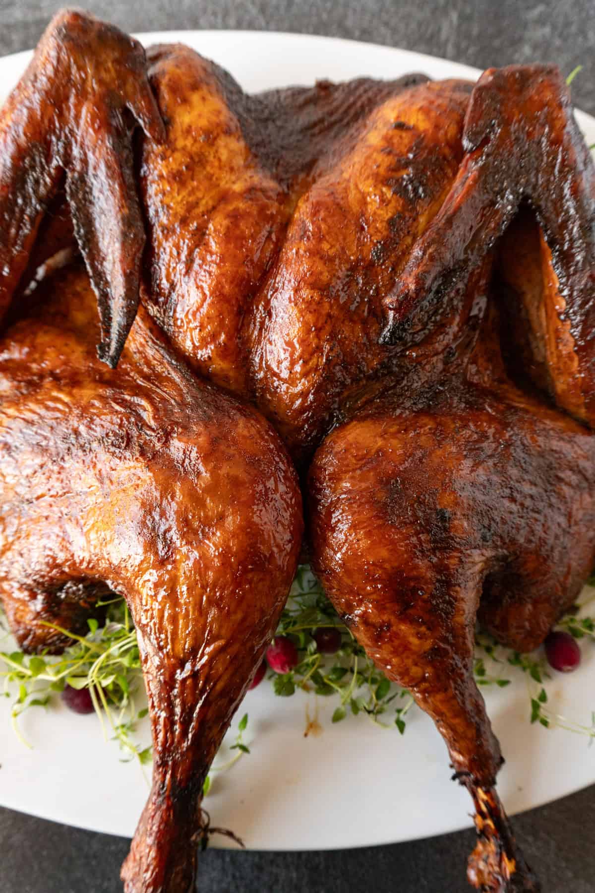 Smoked Spatchcock Turkey with a Cranberry Molasses Glaze!